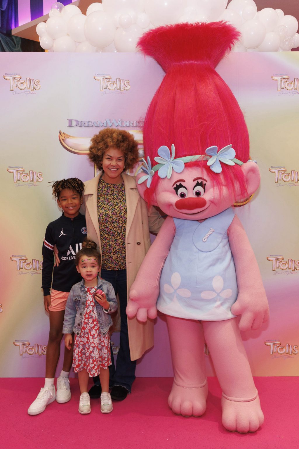Well-known faces step out for premiere of Trolls Band Together