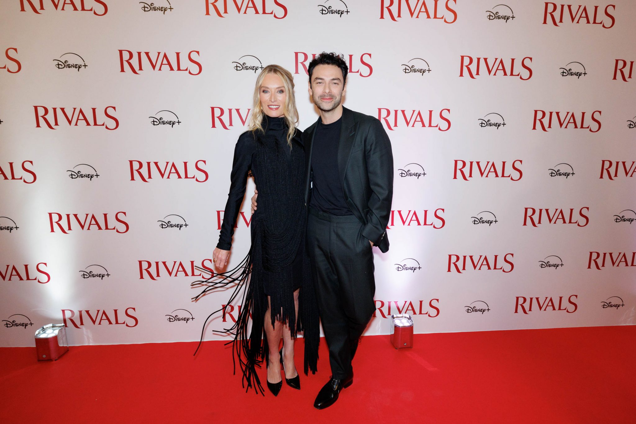 Aidan Turner and Victoria Smurfit walk Rivals red carpet in Dublin