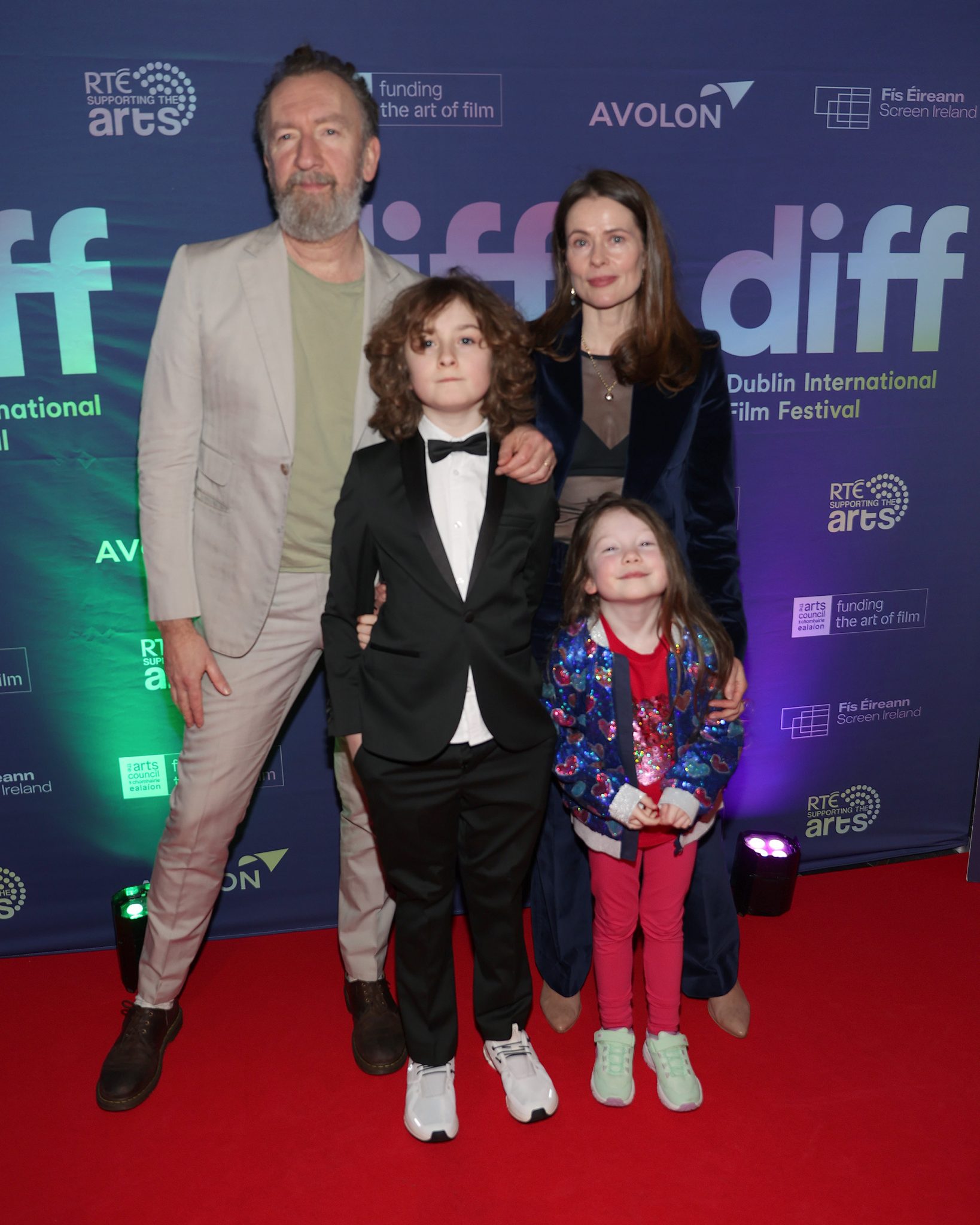 John Carney with his wife Marcella Plunkett and his children Luan and ...